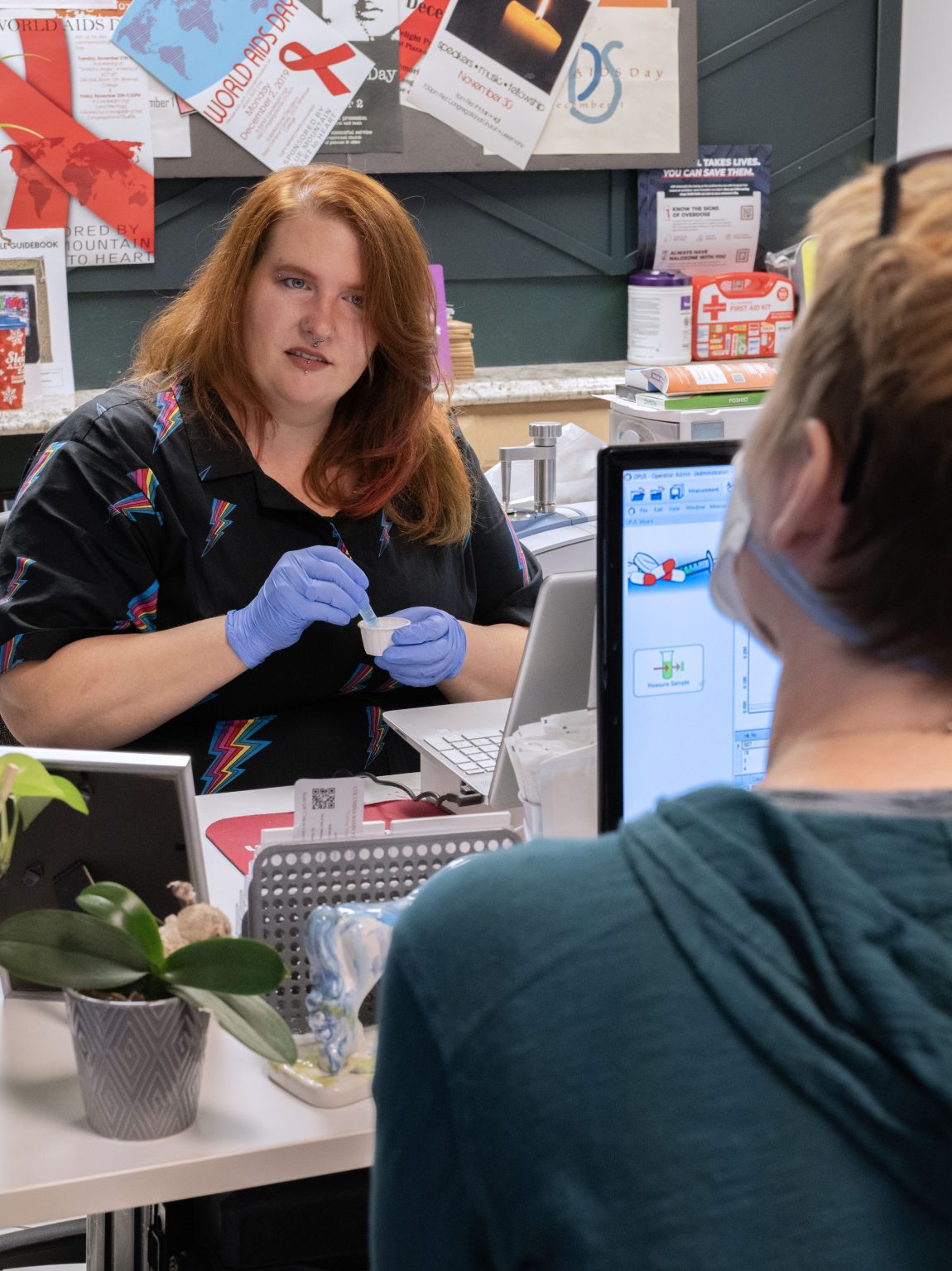 BMH2H051 Patient/client and technician talking about drug checking ...